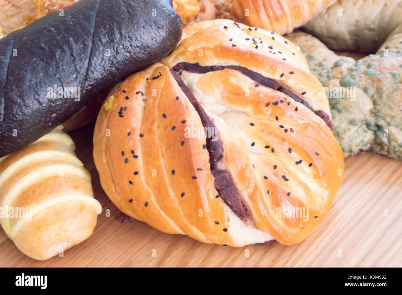 Features a variety of bread products on the table Stock Photo - Alamy