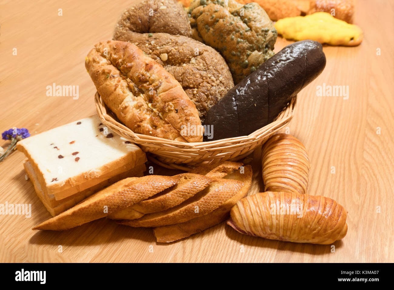 all kinds of bakery products on a wooden desk background Stock Photo ...