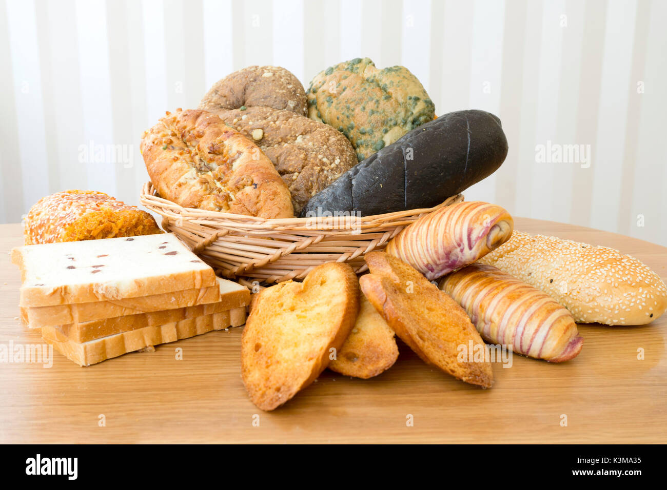 all kinds of bakery products on a wooden desk background Stock Photo ...