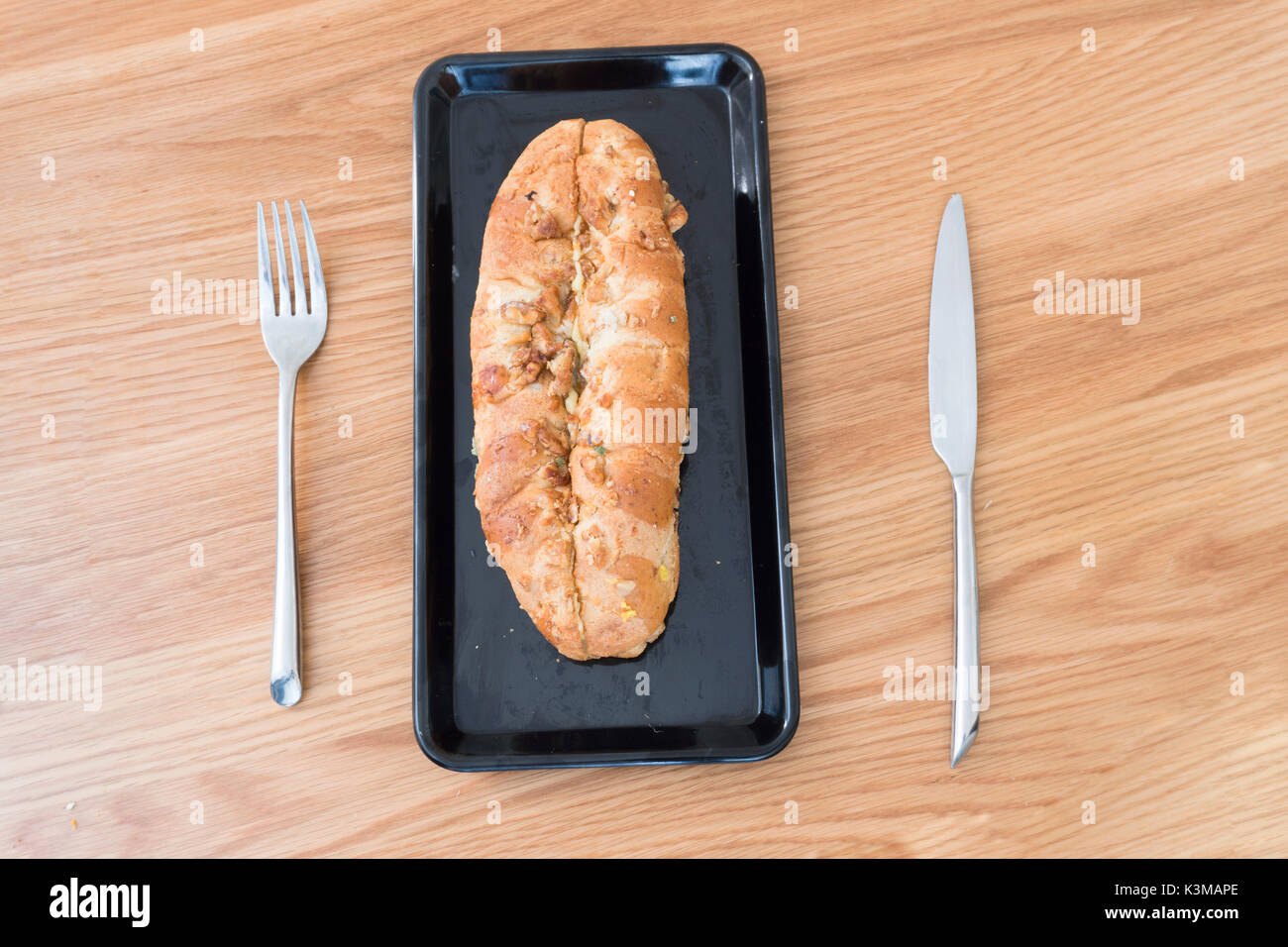 Bread and table set in a restaurant Stock Photo - Alamy