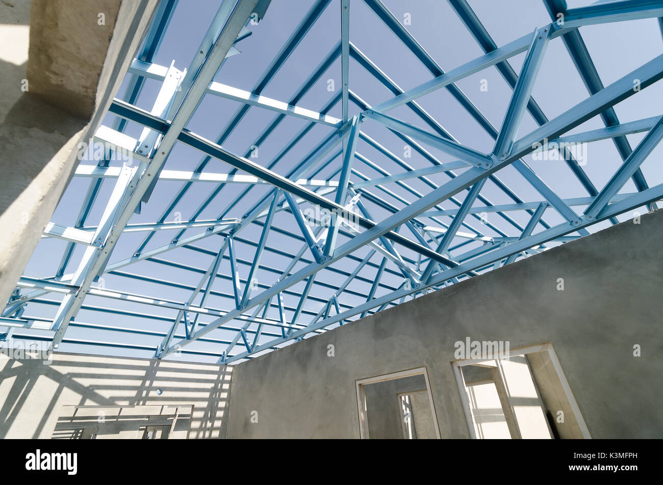 Structure of steel roof frame for building construction on sky ...