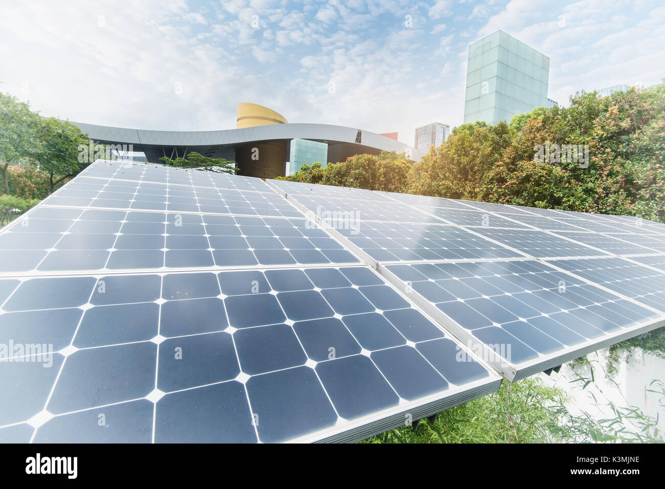 Solar Panels In The Park Of Modern City Stock Photo - Alamy