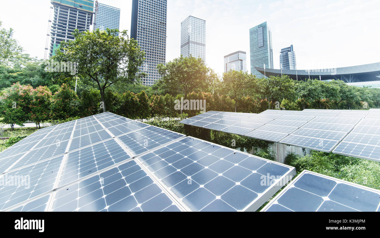 Solar Panels In The Park Of Modern City Stock Photo - Alamy