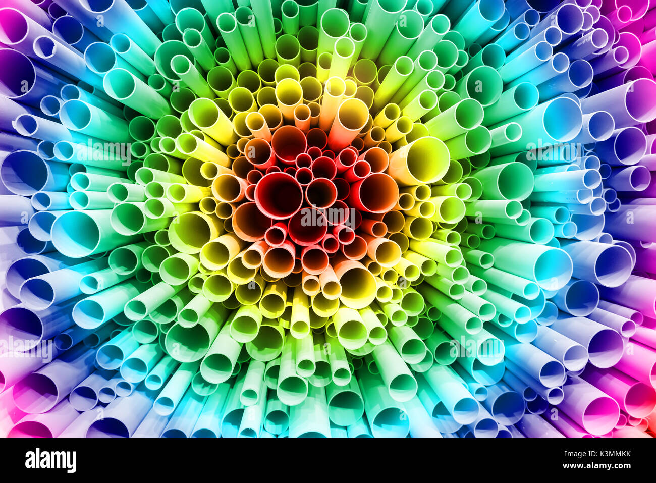 color rainbow of PVC pipes stacked in construction site Stock Photo - Alamy