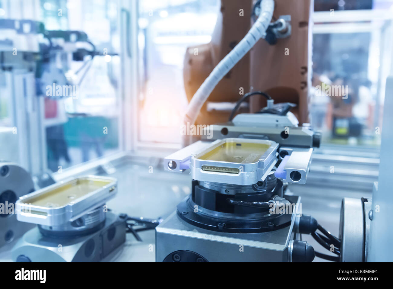 Mobile phone mold in Robotic machine system factory Stock Photo - Alamy