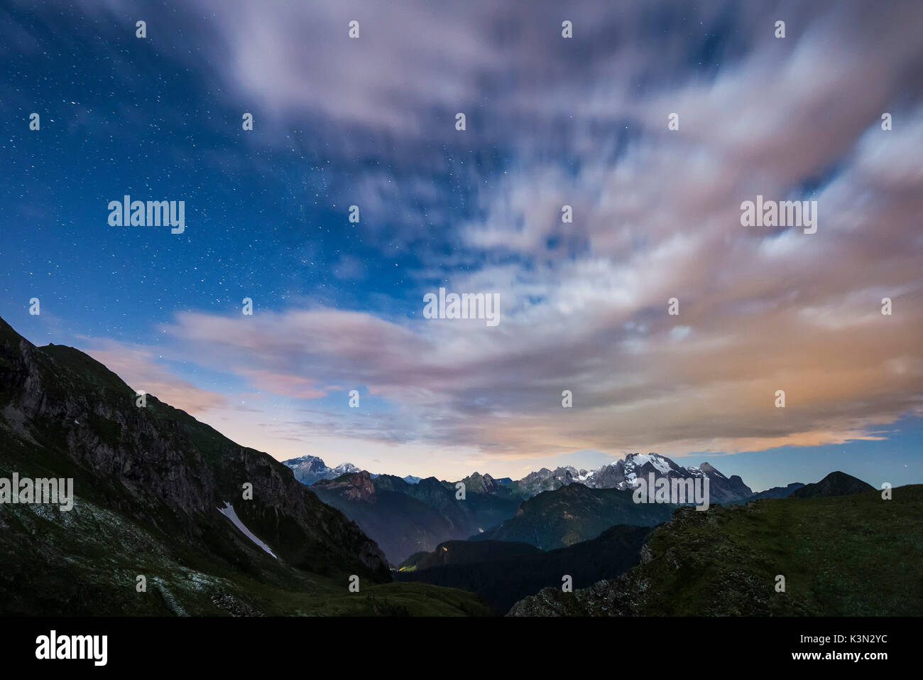 Marmolada glacier by night, starry night with clouds, Giau pass ...