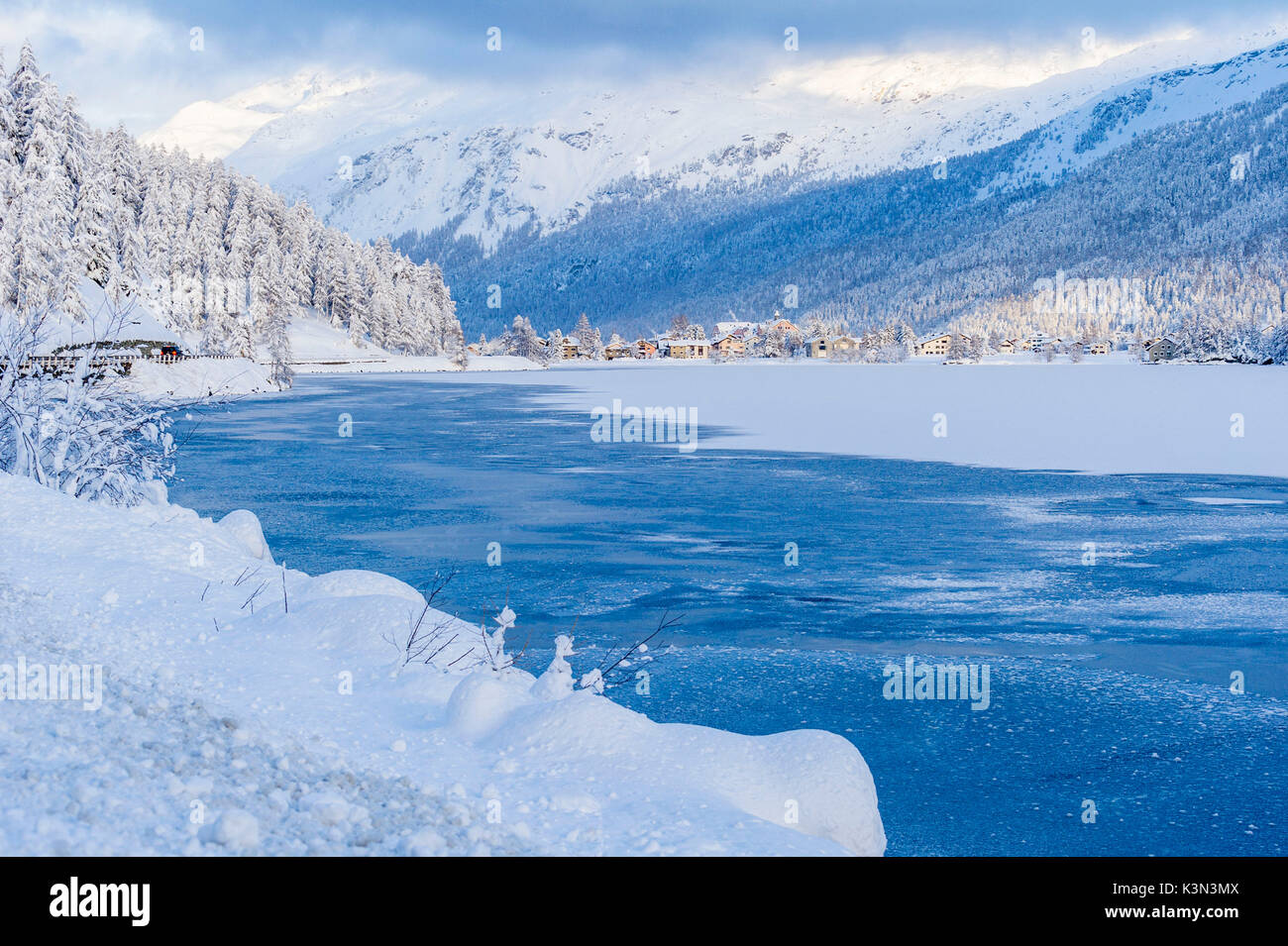 Frozen alpine lake in winter. Engadine, Switzerland Stock Photo - Alamy