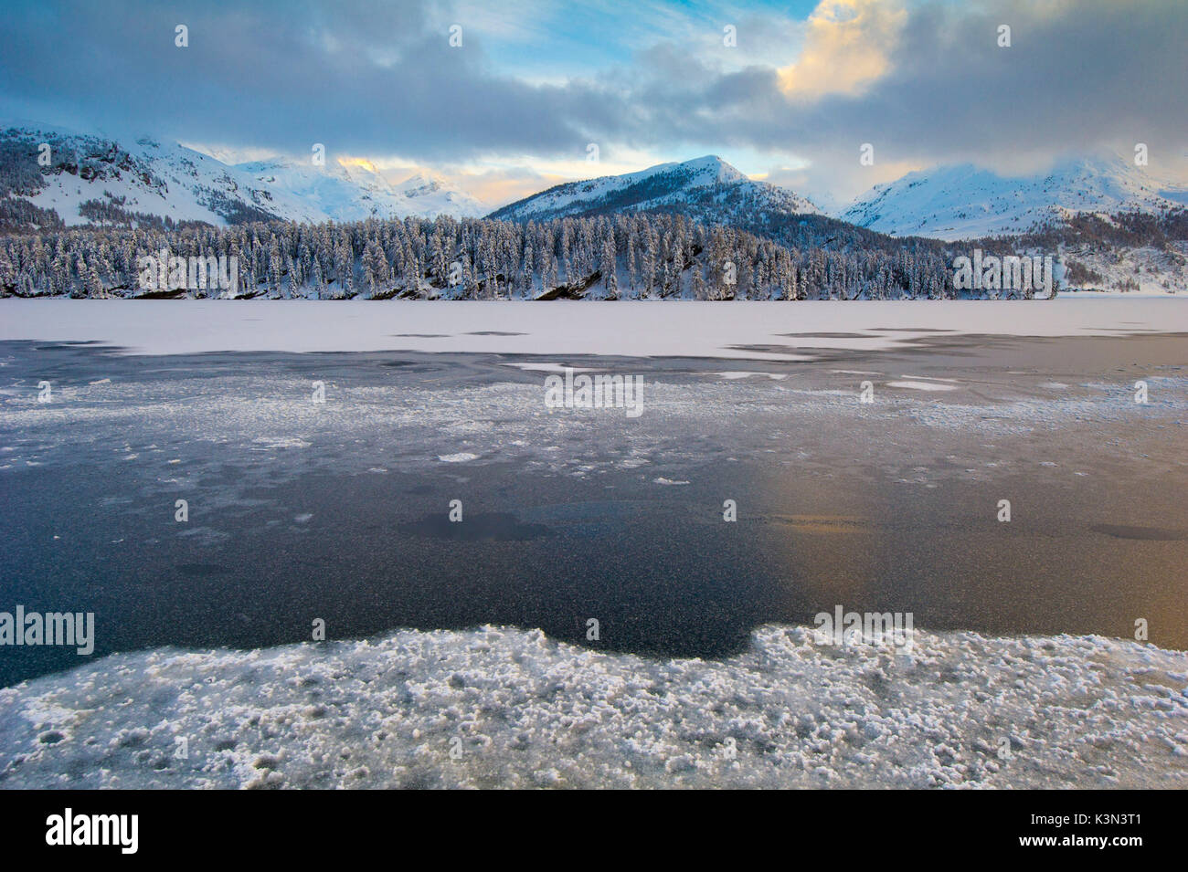Frozen alpine lake in winter. Engadine, Switzerland Stock Photo - Alamy