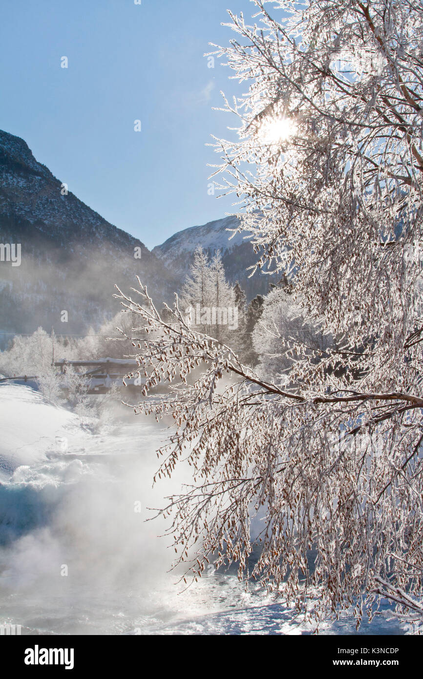 Frost winter landscape along a river in Engadin - Switzerland Stock ...