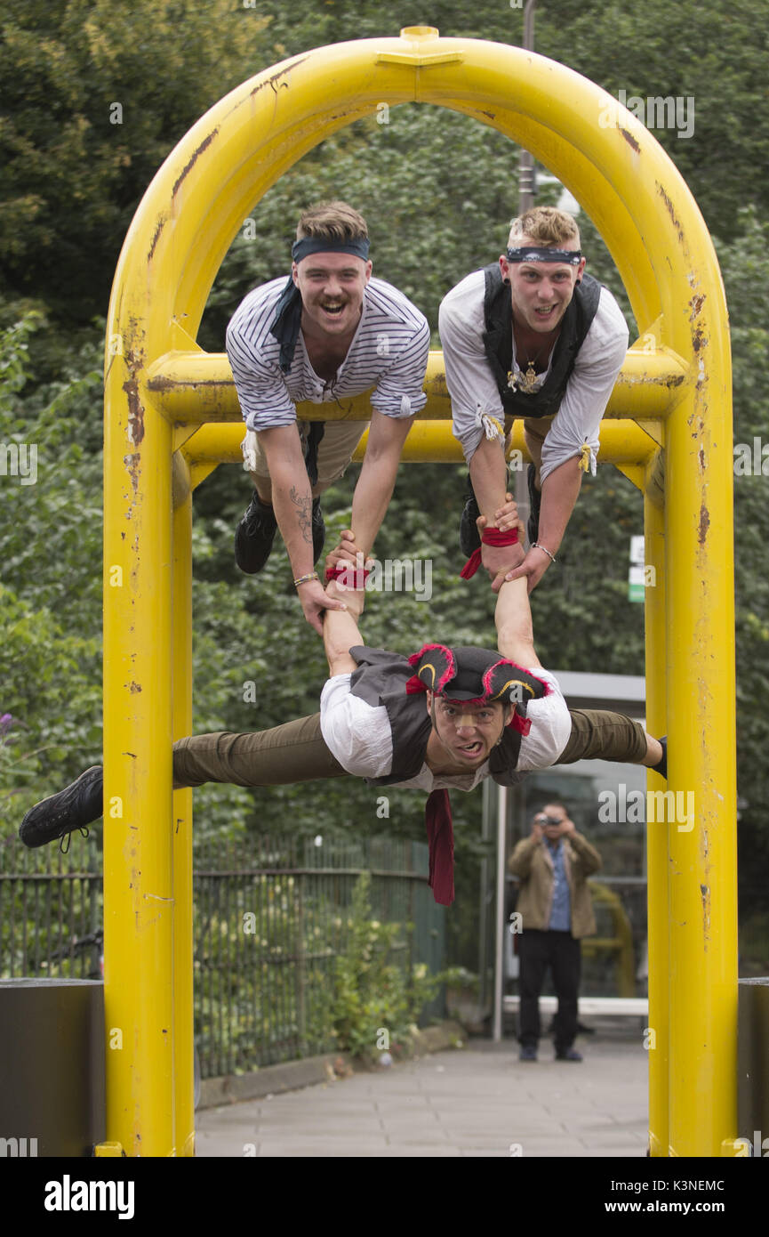 Performers Fabian Galouÿe, Ronan Jenkinson, and Samuel Letch from "Arr ...