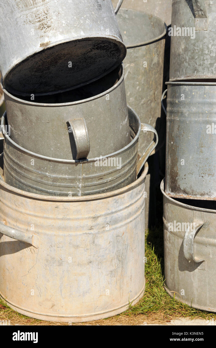 A collection assortment of galvanised steel basins buckets and bathtubs ...