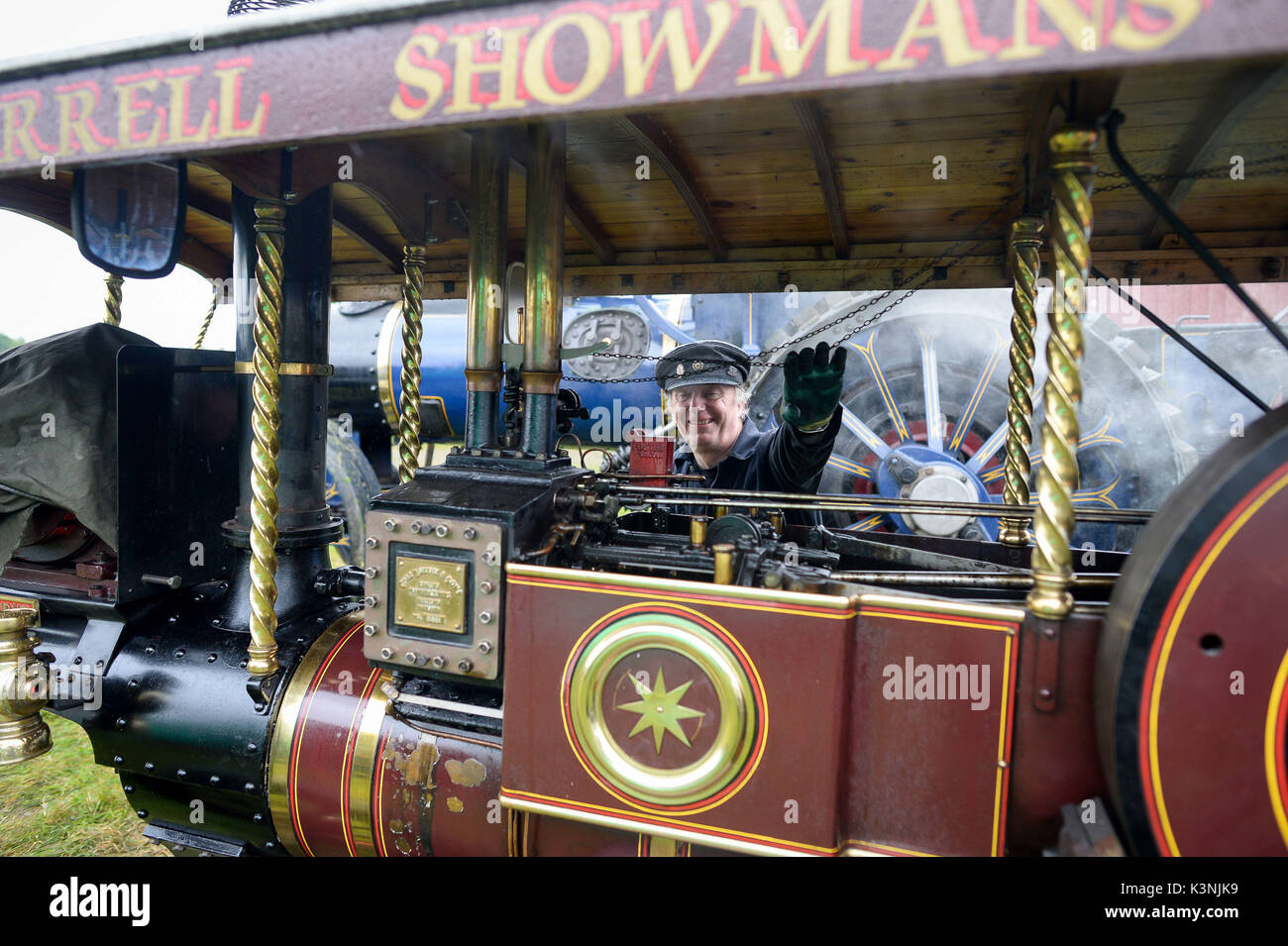 A steam enthusiast cleans and check components on his showmans steam ...