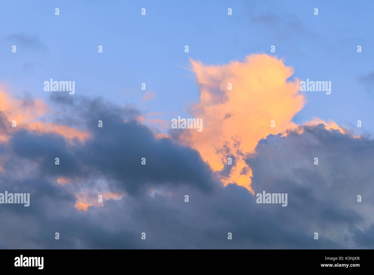 Contrasty colorful storm clouds in the evening sky Stock Photo - Alamy