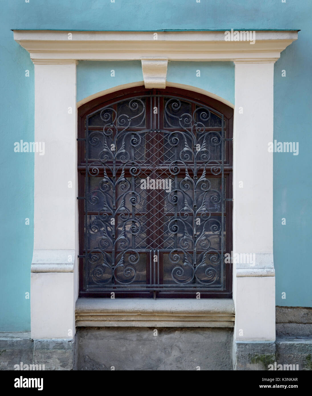 Windows with black bars with decoratios Stock Photo - Alamy