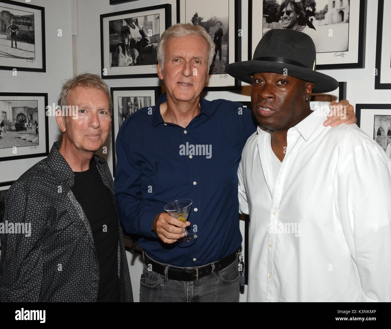 (L-R) Owner Mr. Musichead Sam Milgrom,filmmaker James Cameron Vince ...
