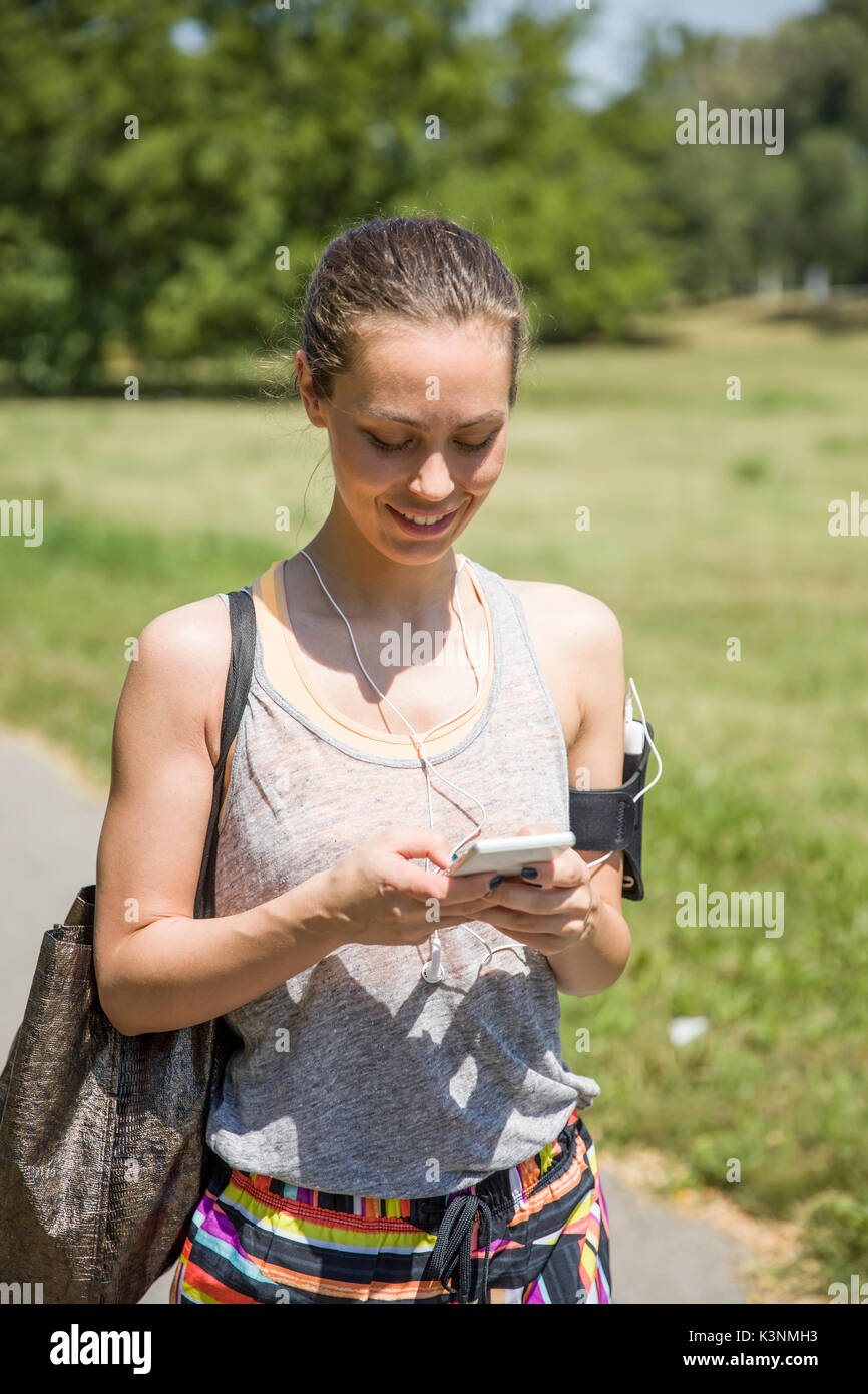 Runner listening music hi-res stock photography and images - Alamy