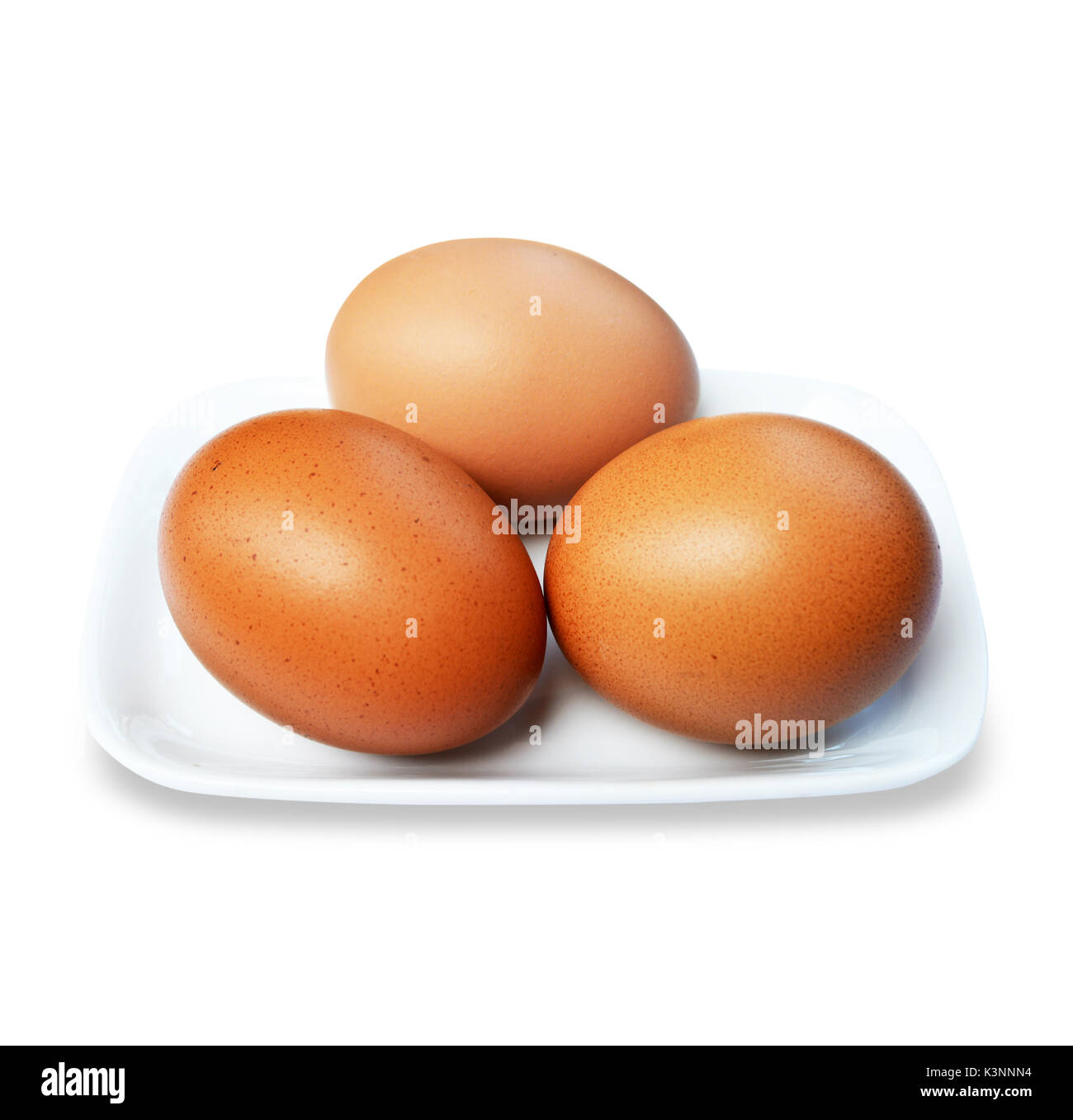 Tree eggs on dish isolated, on white background with clipping path ...