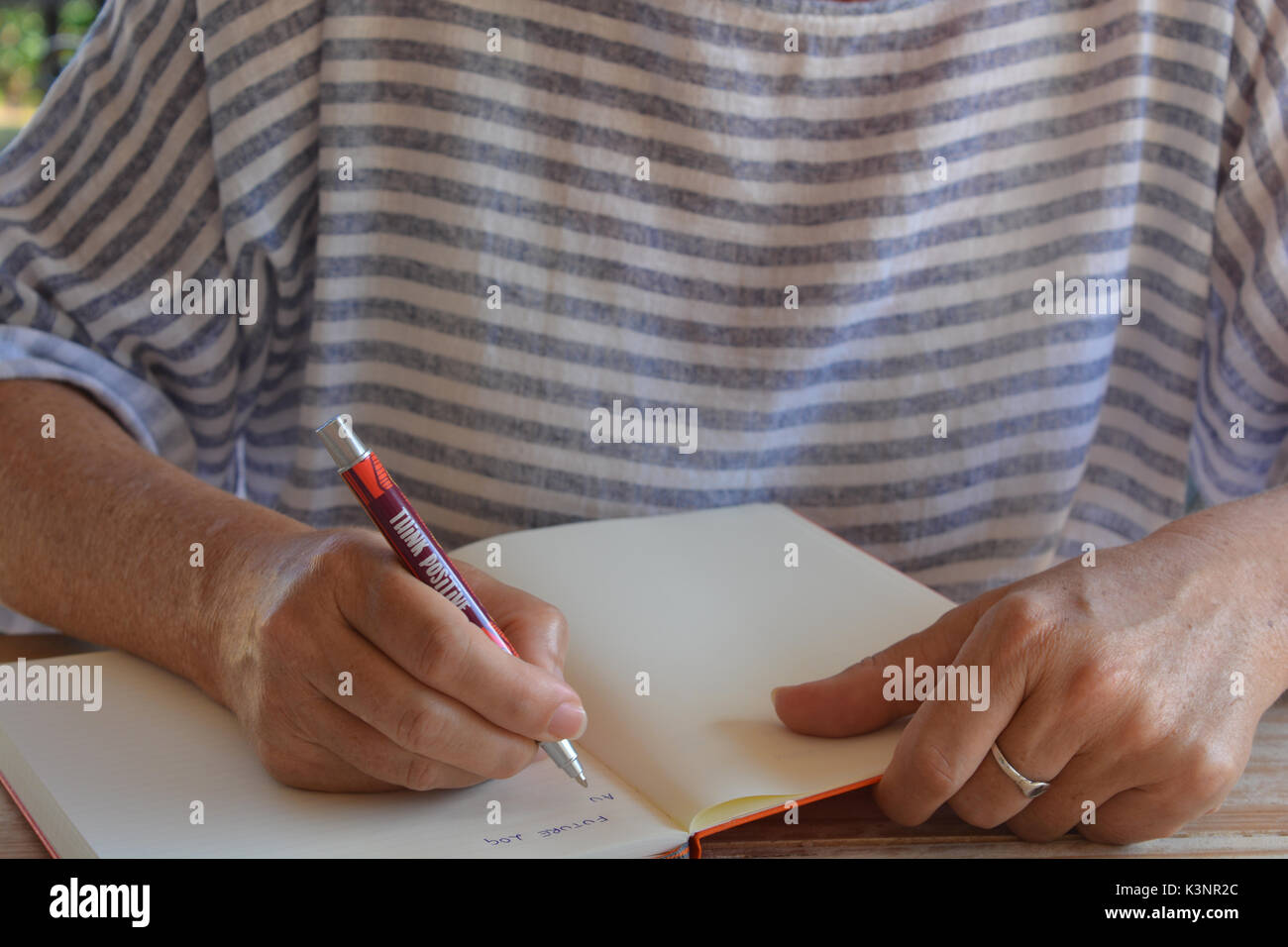 Hand holding bullet hi-res stock photography and images - Alamy