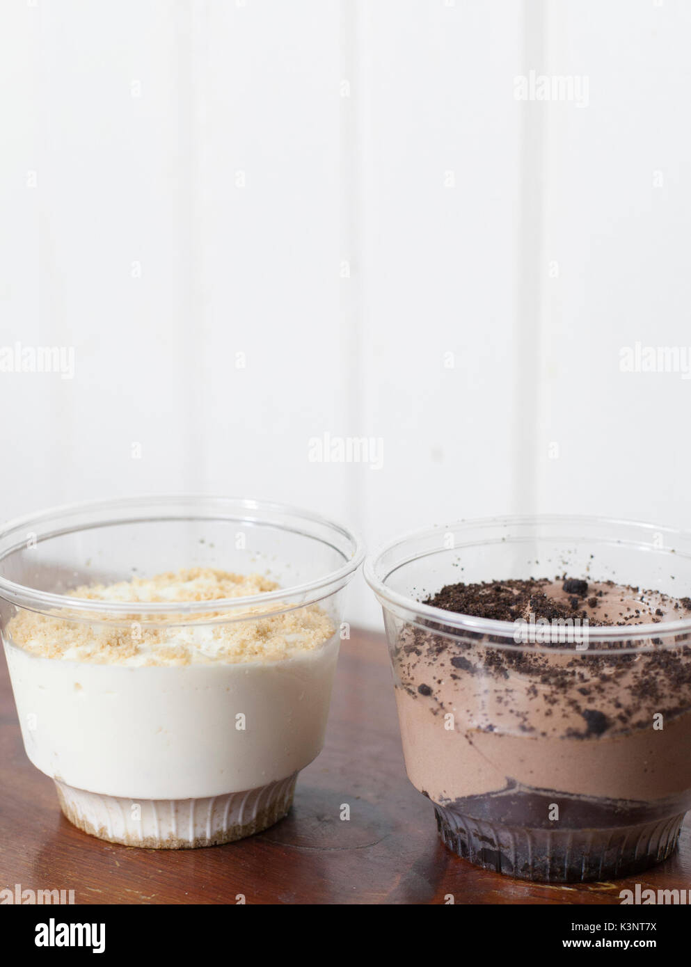 Close up of chocolate and vanilla pudding in serving portions Stock ...