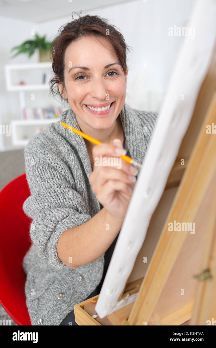 happy artist painting Stock Photo - Alamy