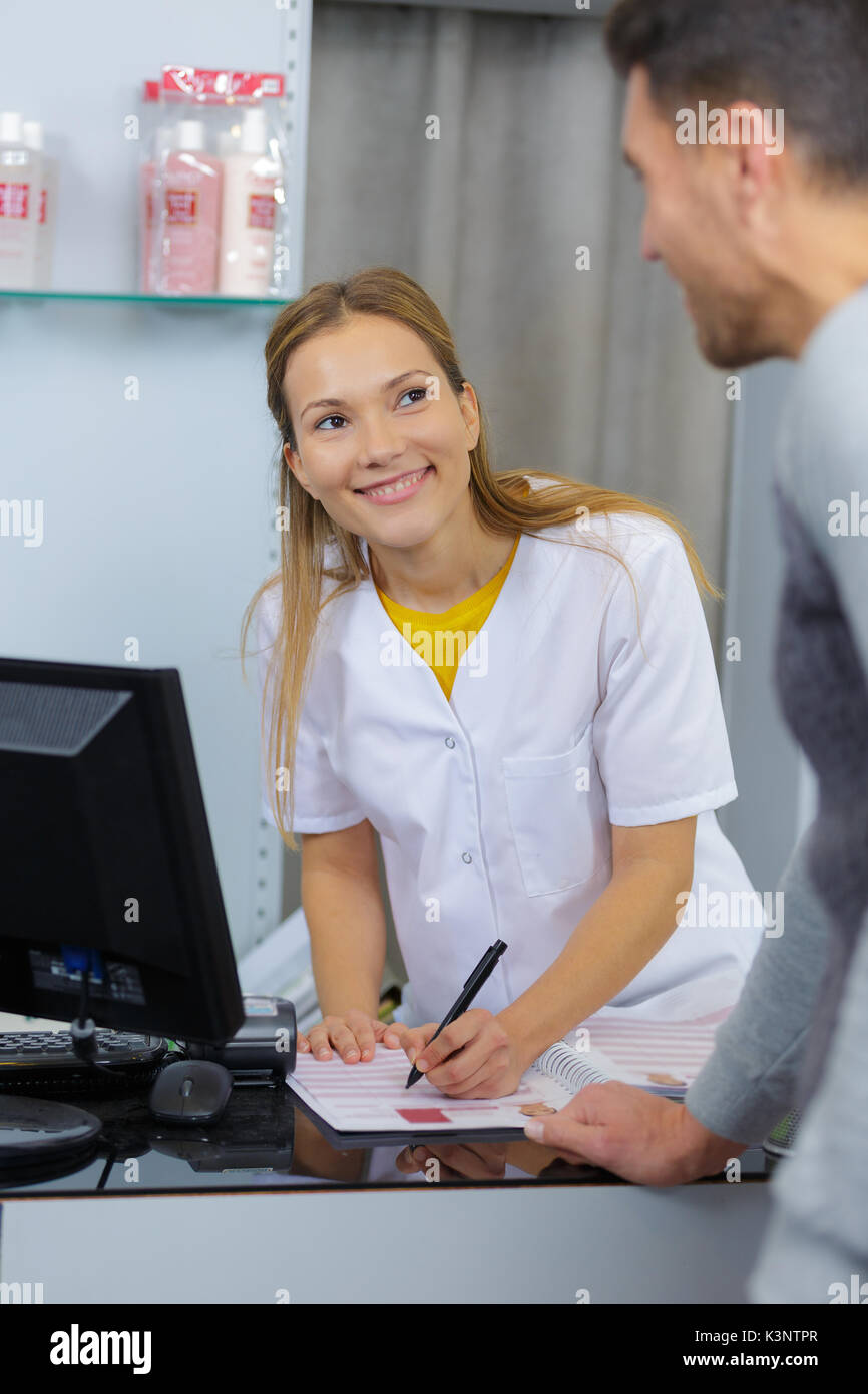 Client paying in barbershop hi-res stock photography and images - Alamy