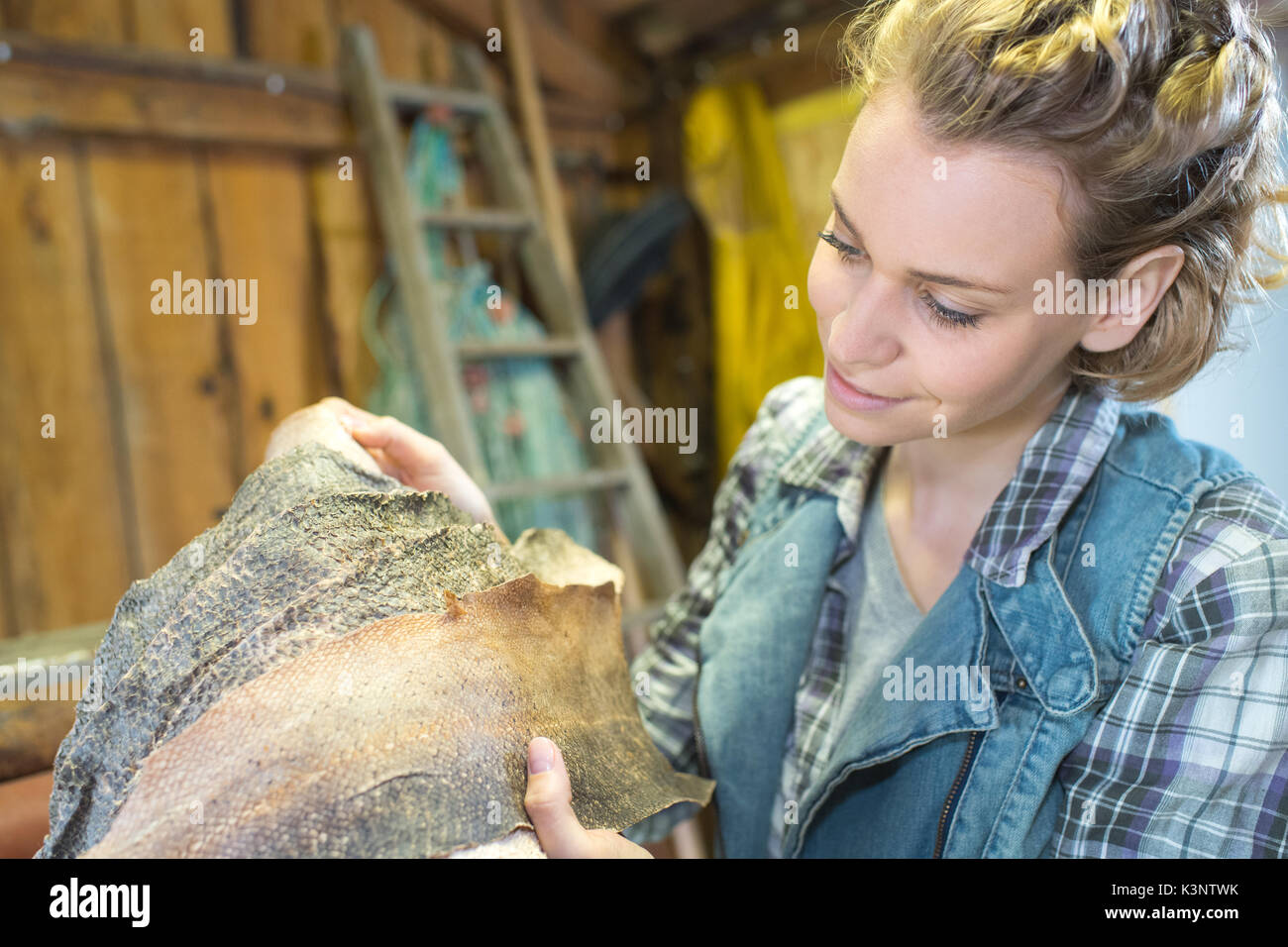 traditional tanner cleaning the leather in old tannery Stock Photo - Alamy