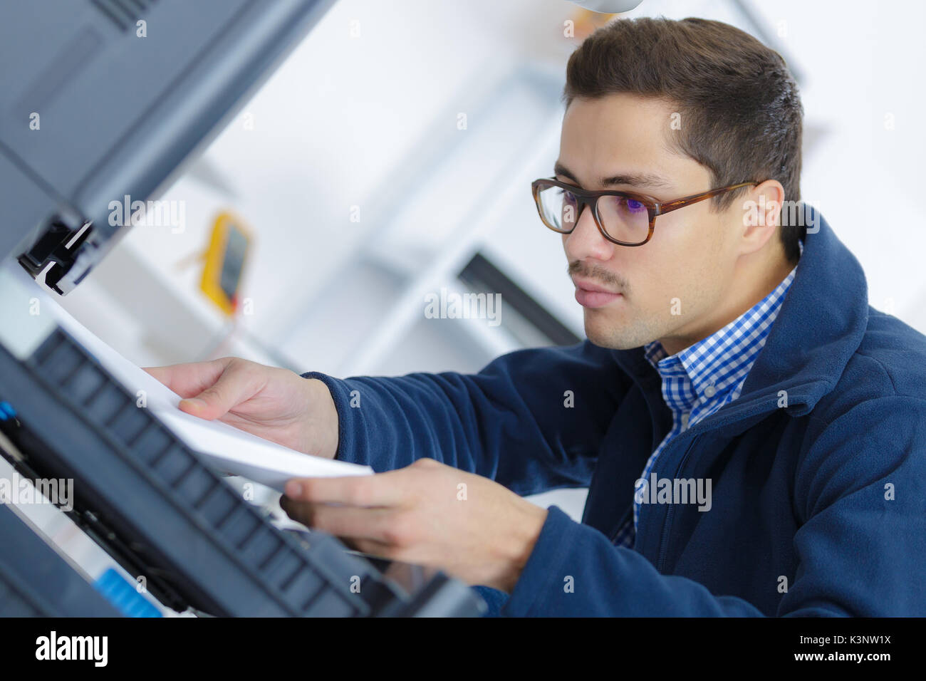 Technician repairing printer hi-res stock photography and images - Alamy
