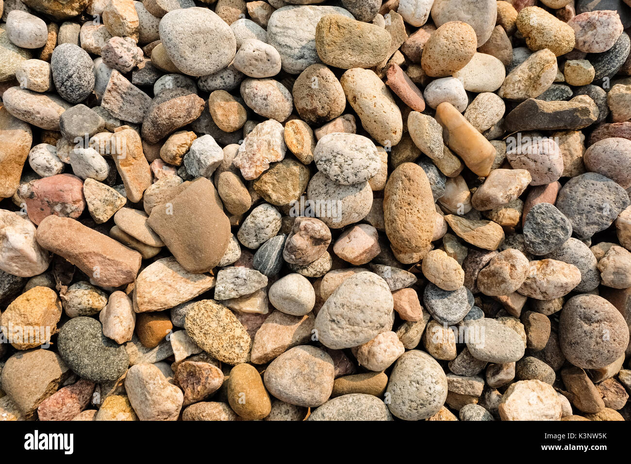Rounded river rocks hi-res stock photography and images - Alamy