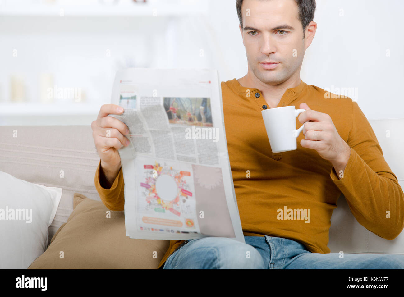 man reading newspaper Stock Photo - Alamy