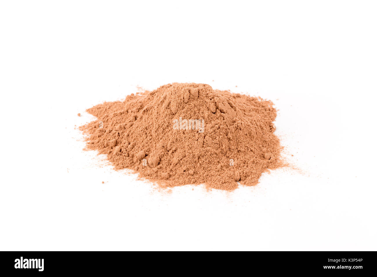 Heap of cocoa powder isolated on a white background Stock Photo - Alamy