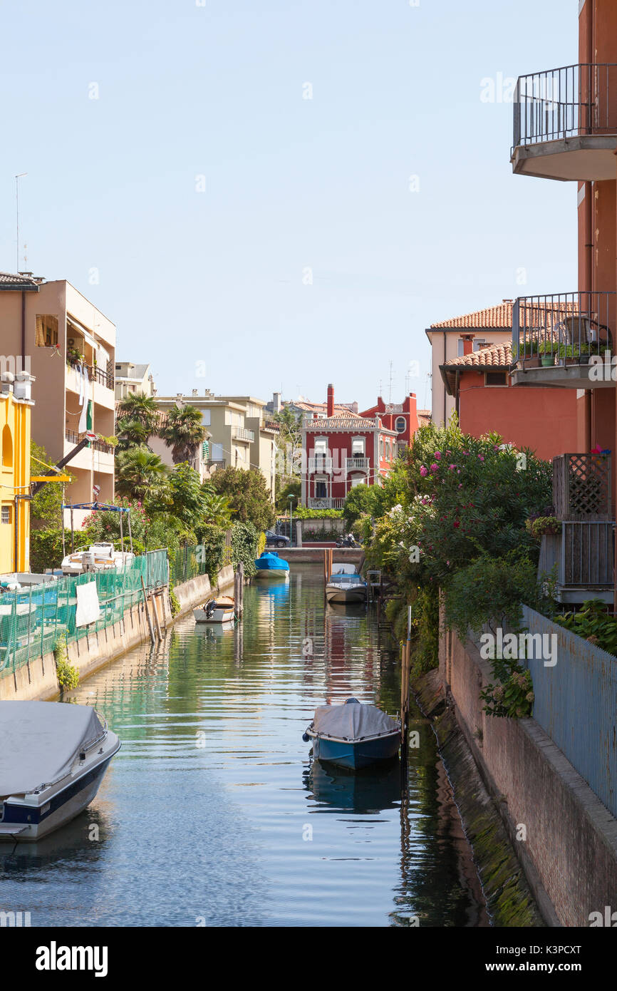 Scenic canal on Lido Island, Venice, Veneto, Italy with colorful ...