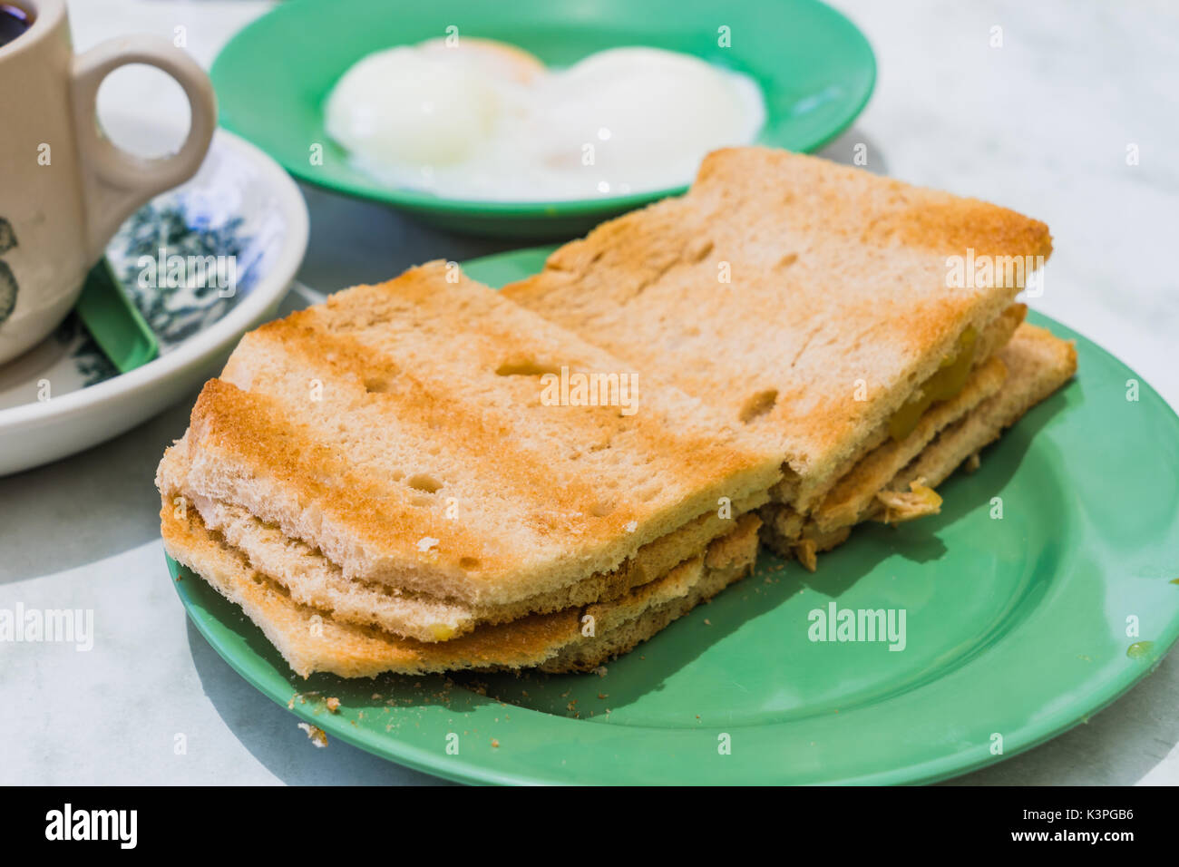 Traditional Singapore Breakfast called Kaya Toast, Bread with Coconut ...