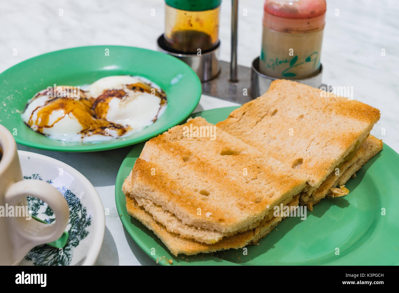 Traditional Singapore Breakfast called Kaya Toast, Bread with Coconut ...