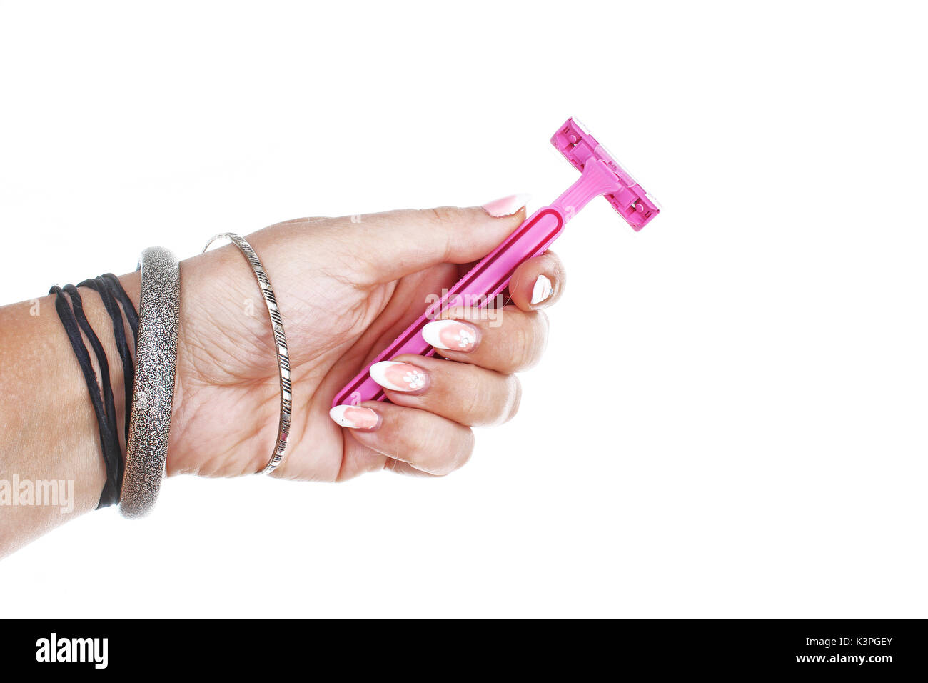 Woman hand holding pink razor on isolated white cutout background ...