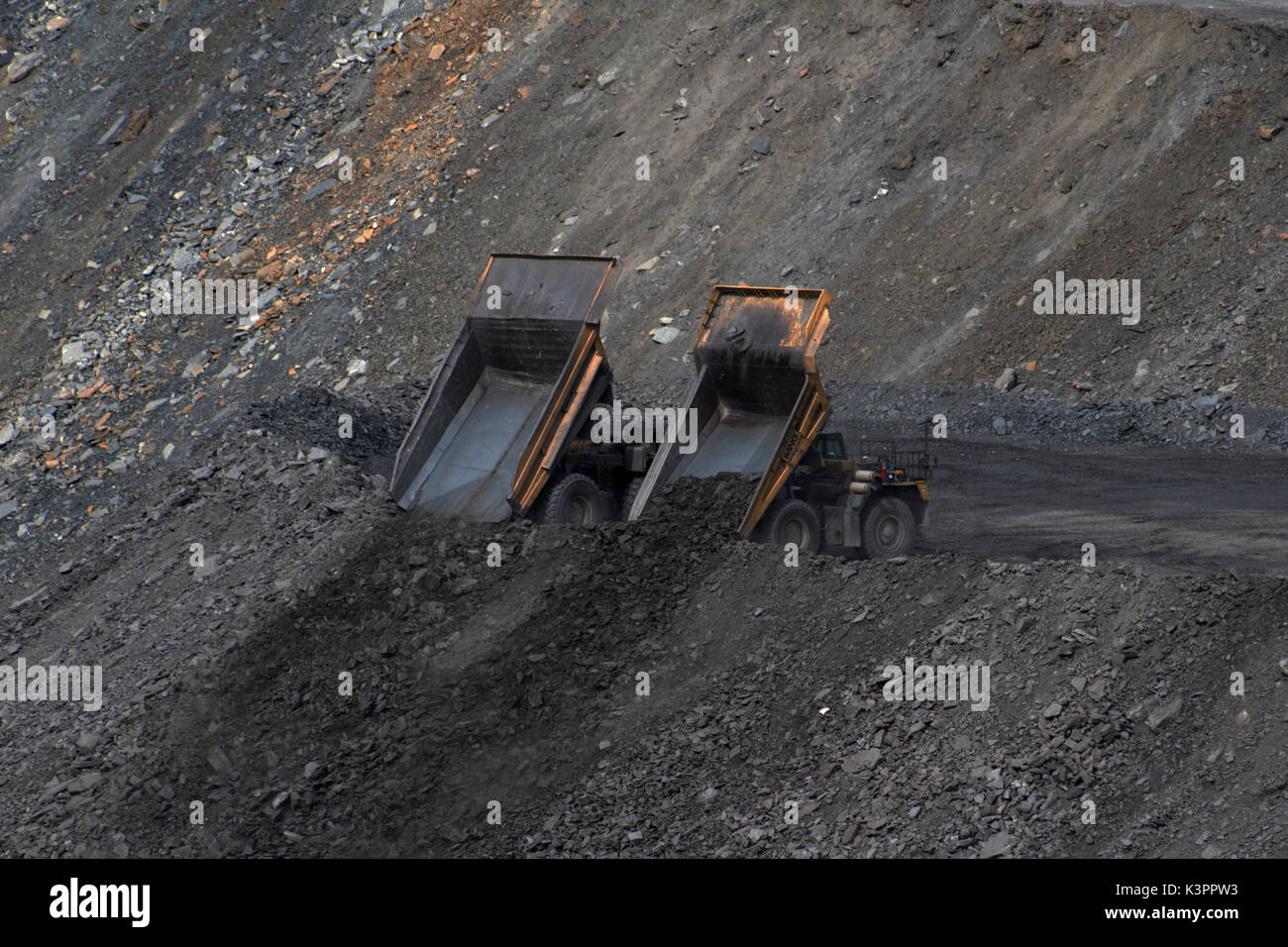 Dumping site trucks hi-res stock photography and images - Alamy