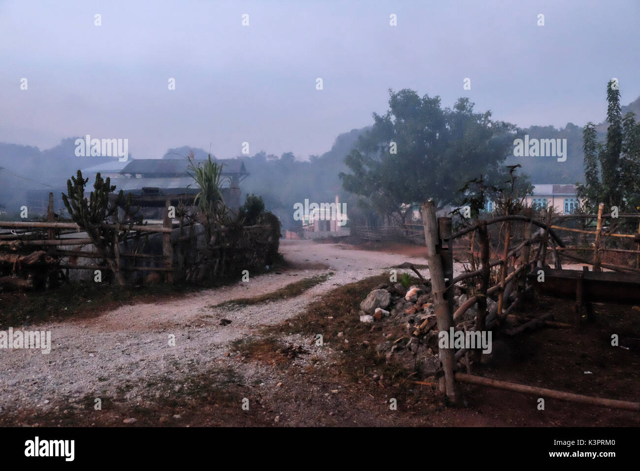 An early morning view of a traditional rural Burmese village, Myanmar ...