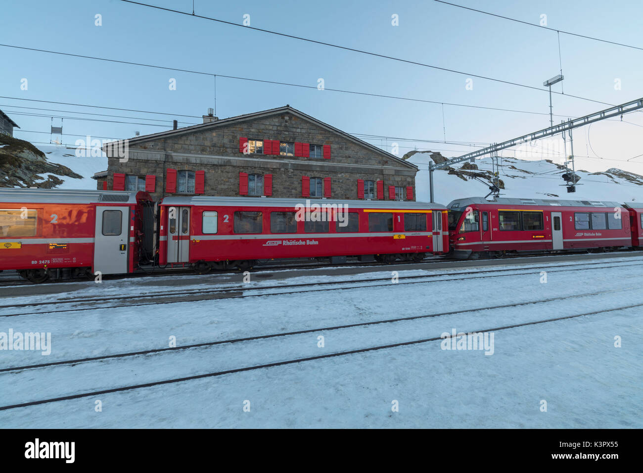 The Bernina Express train at the railway station of Ospizio Bernina ...