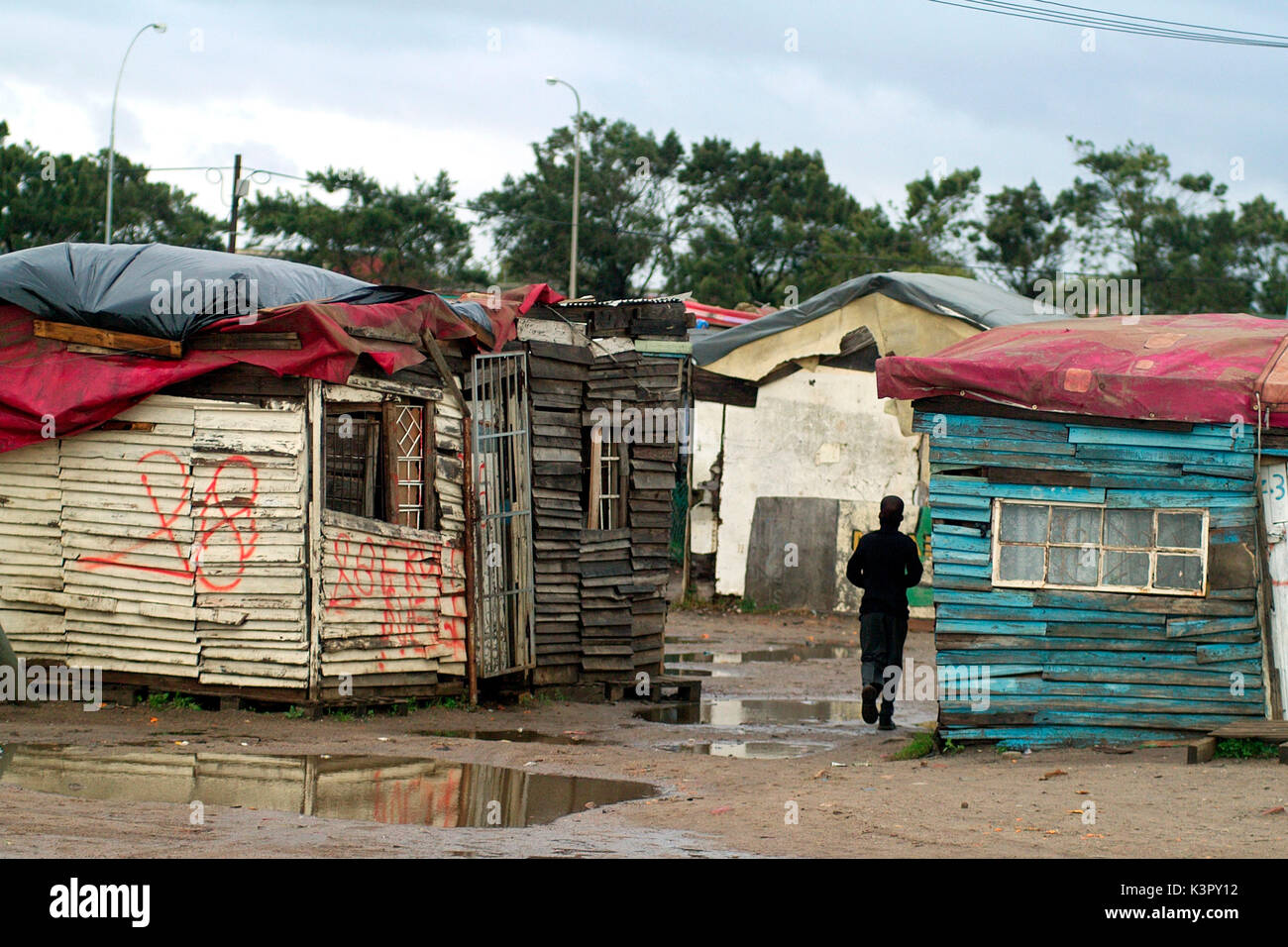 Houses and slums in the township of Langa in Cape Town reflecting in ...
