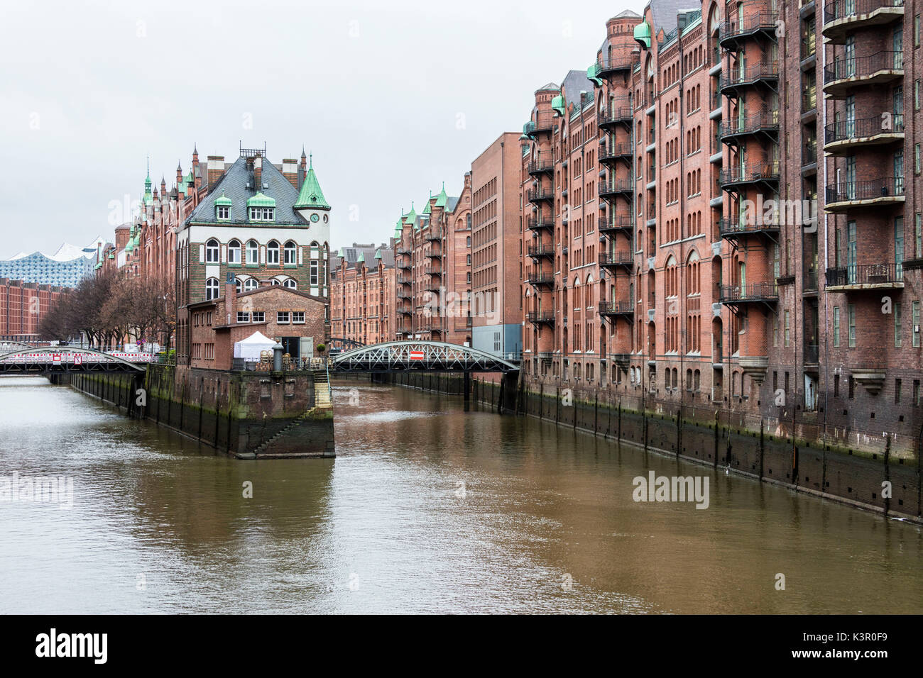 The picturesque water castle between bridges in the center of the canal ...