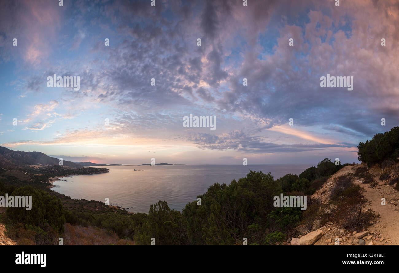 The colors of sunrise are reflected on the sea around the beach of ...