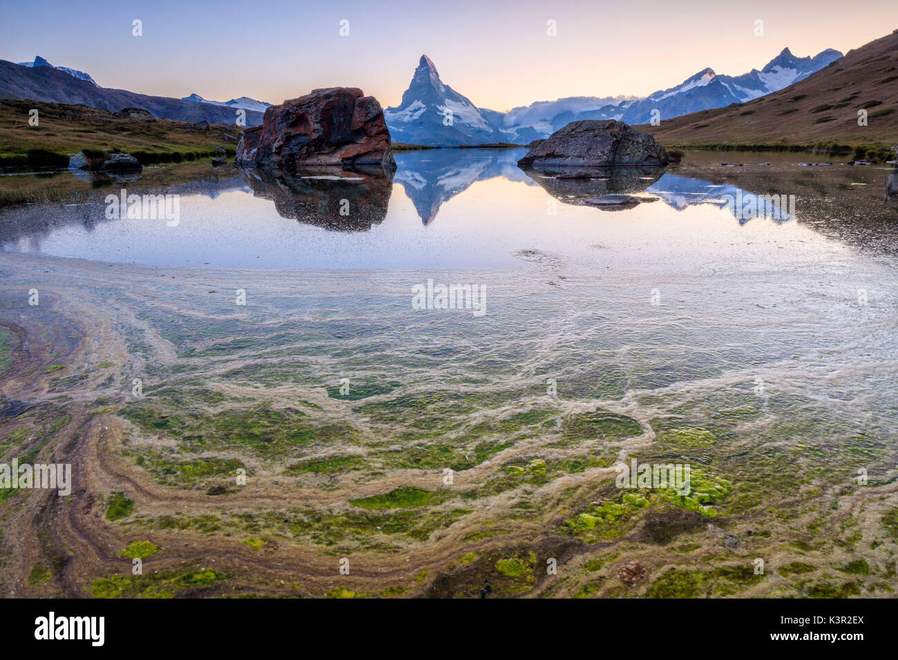 Switzerland matterhorn is reflected into the stellisee lake hi-res ...