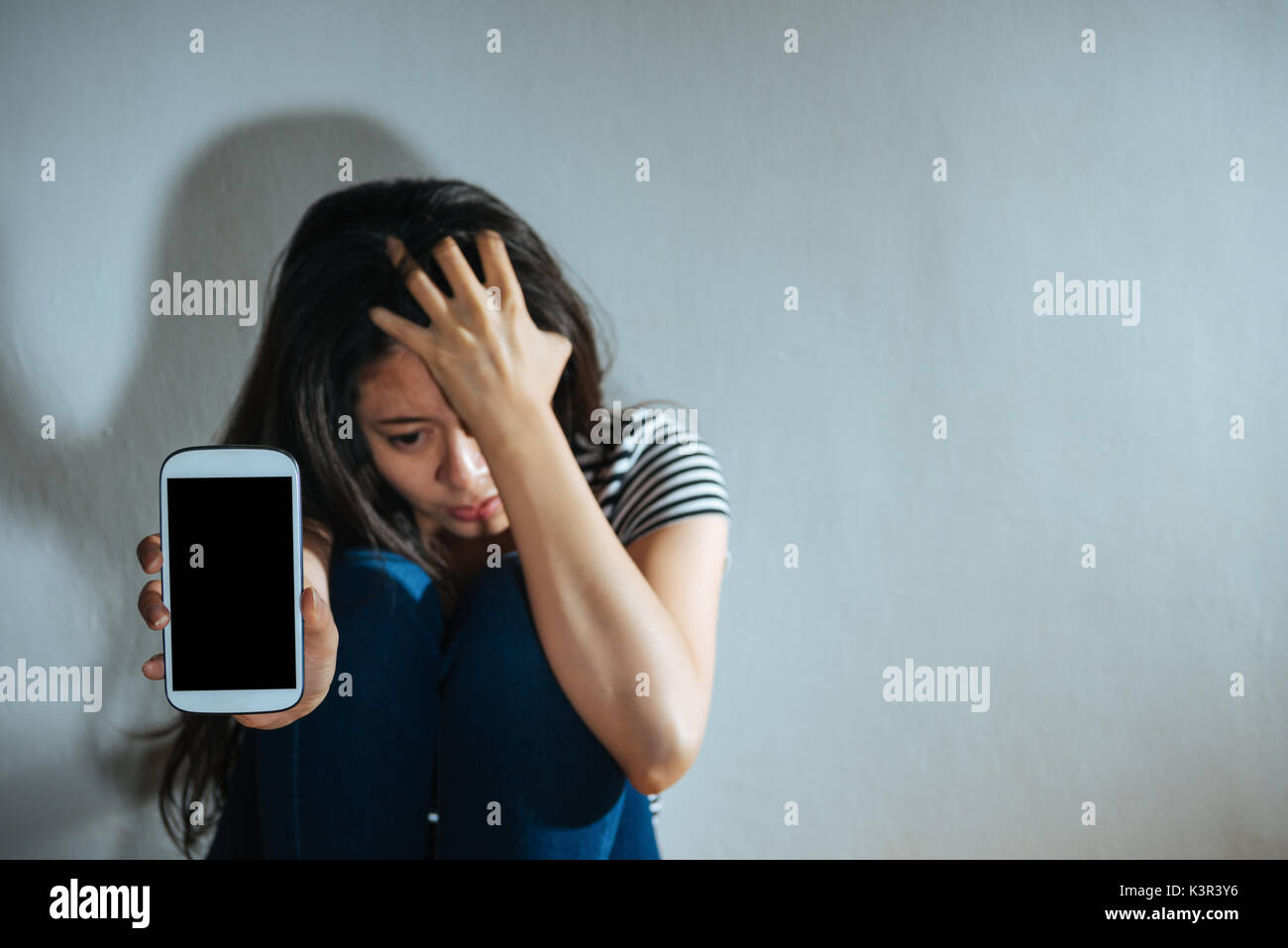 selective focus photo of depressed sadness woman sitting in dark white ...