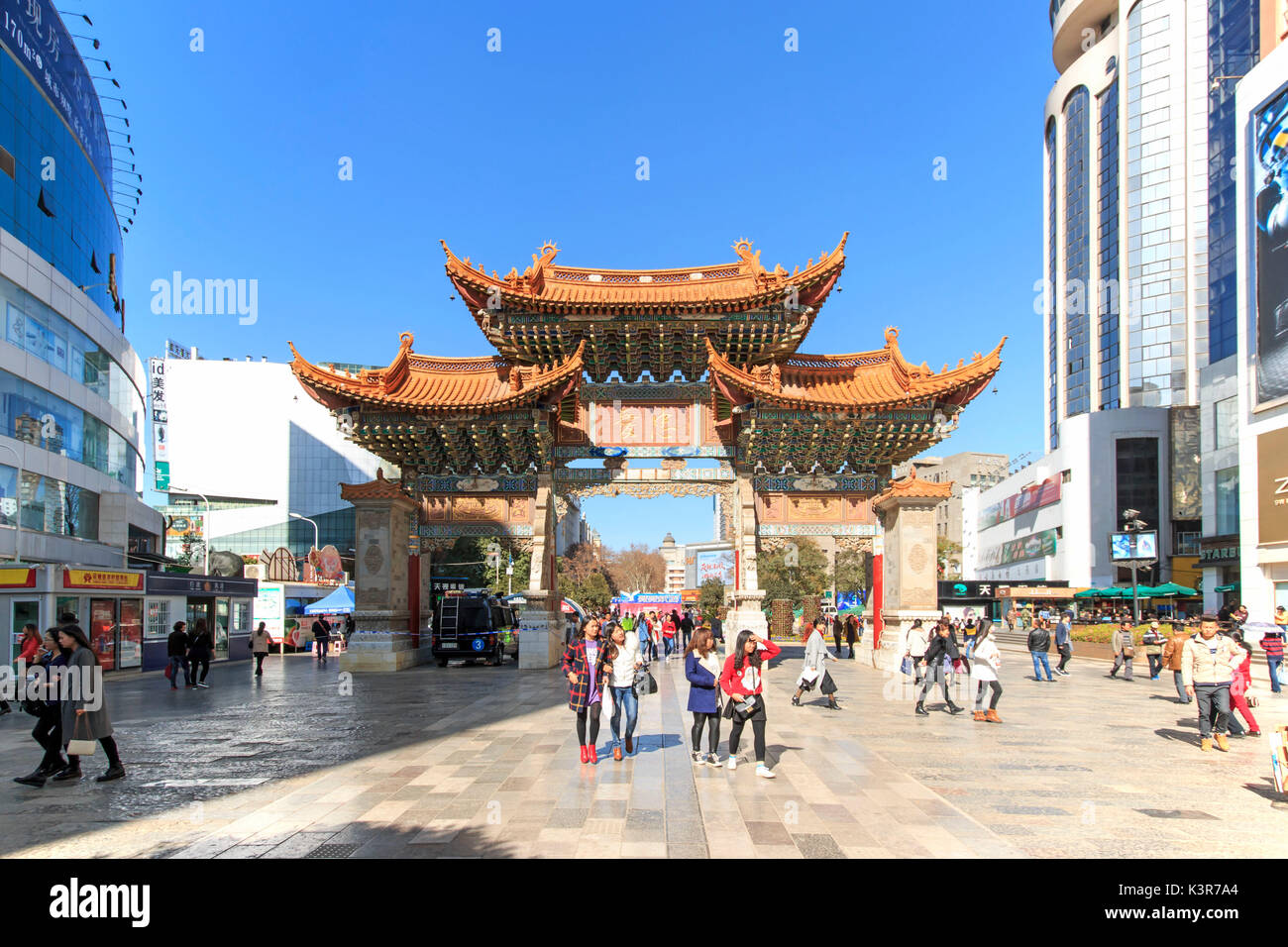 Tourists walking in the city center of Kunming in China Stock Photo - Alamy