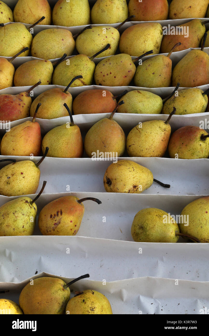 Pears are packed carefully to prevent bruising and to show the maximum ...