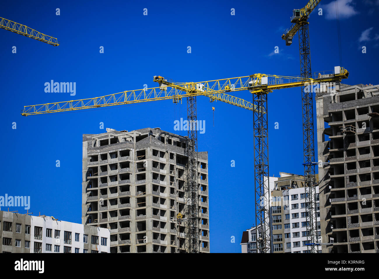 Construction concept. A new building under construction against the sky ...