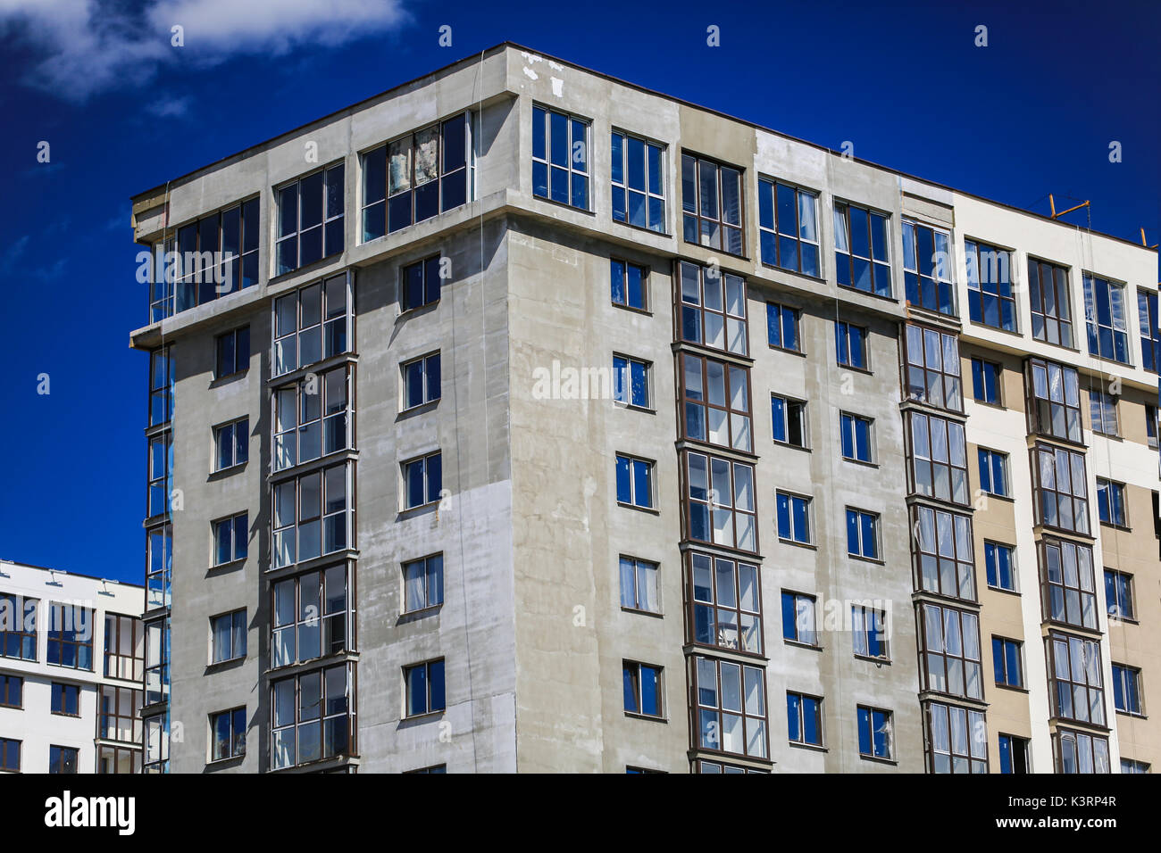Construction concept. A new building under construction against the sky ...