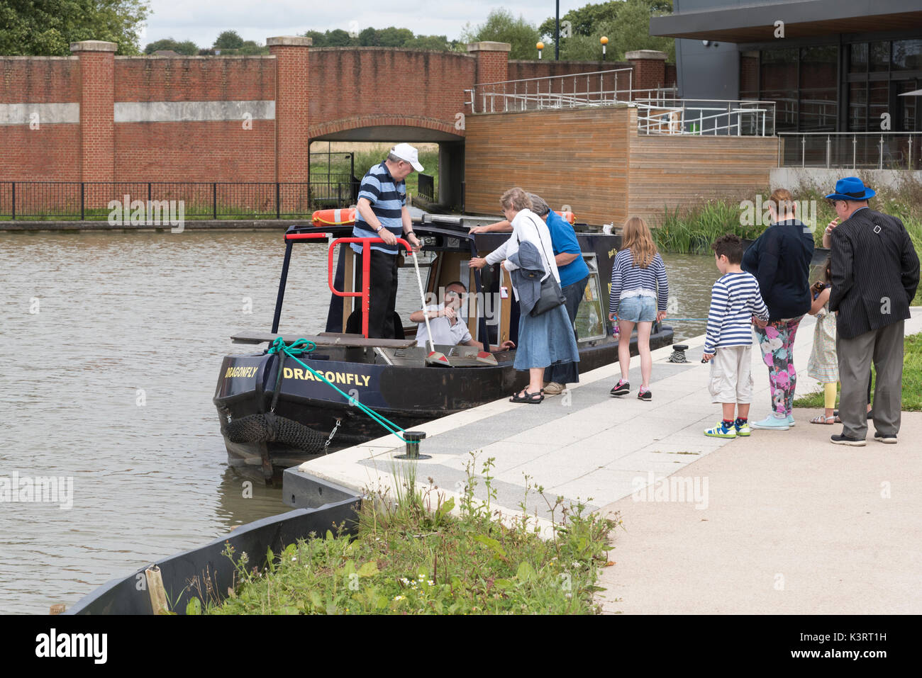 The Dragonfly canal boat with passengers boarding for a trip along the ...
