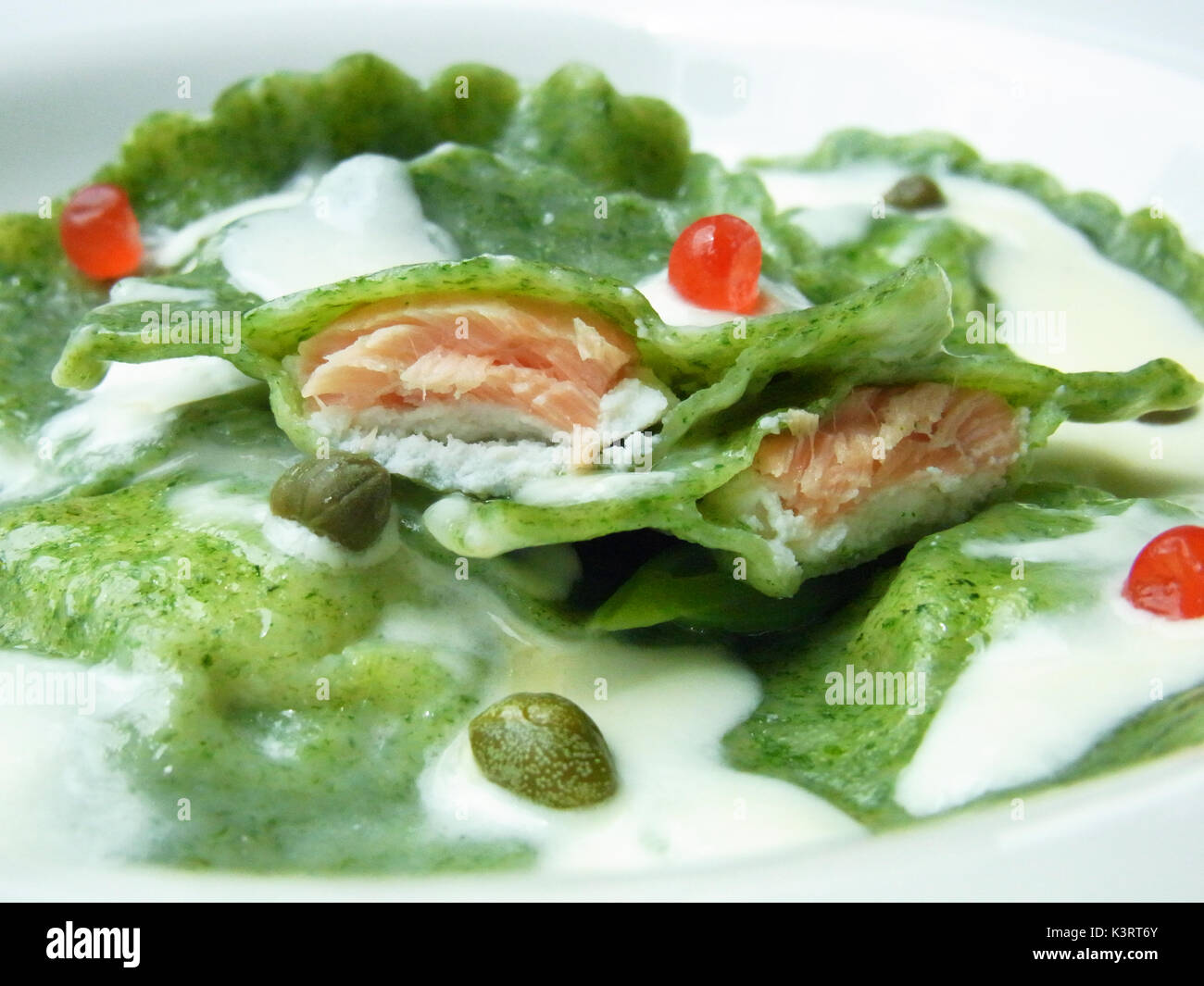 salmon stuffed in green ravioli made from spinach cooked with white ...