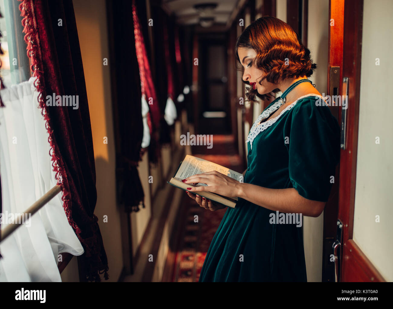 Young woman travels, vintage train compartment. Old wagon interior ...