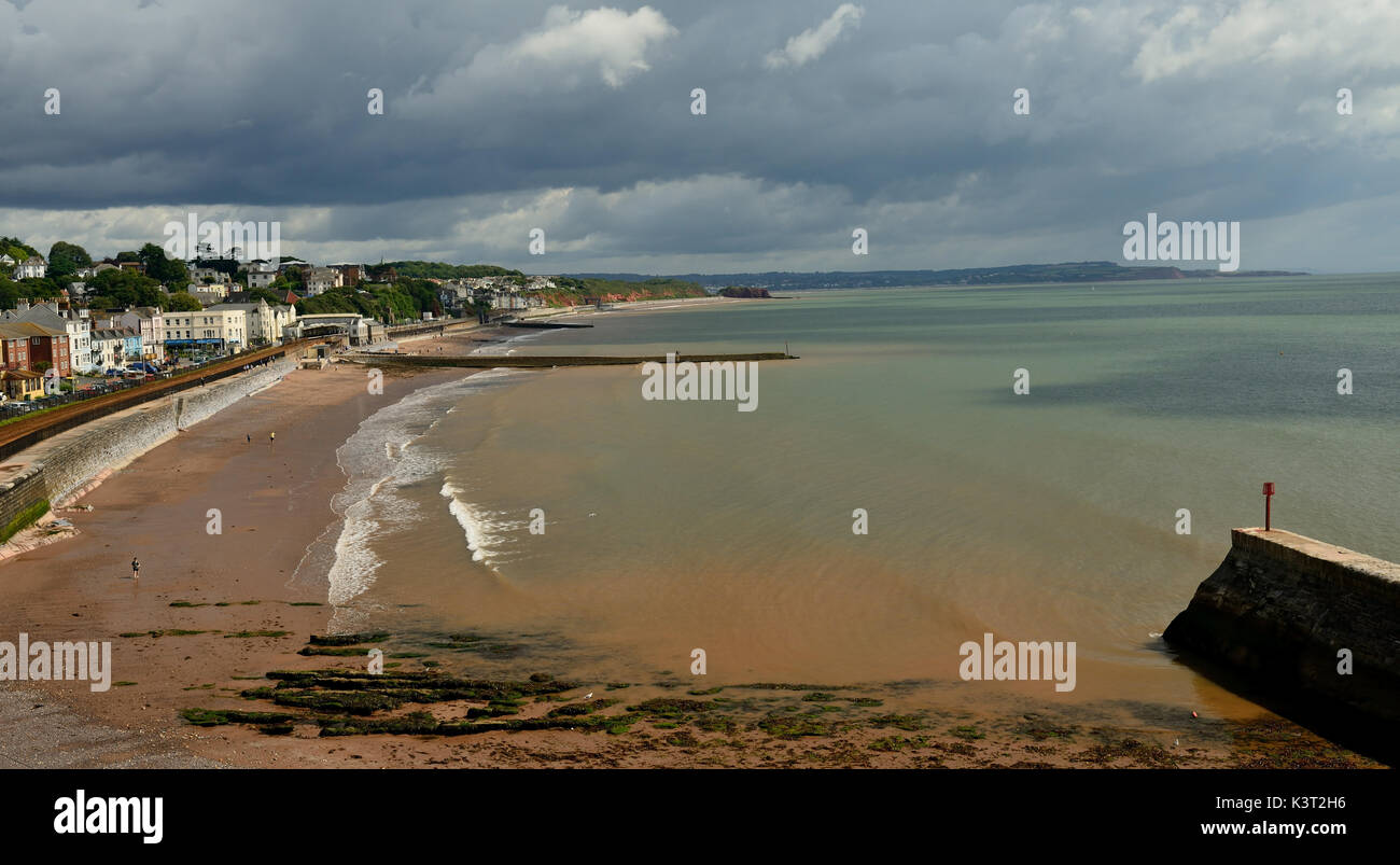 Sunshine and dark clouds over Dawlish seafront, looking towards Exmouth ...